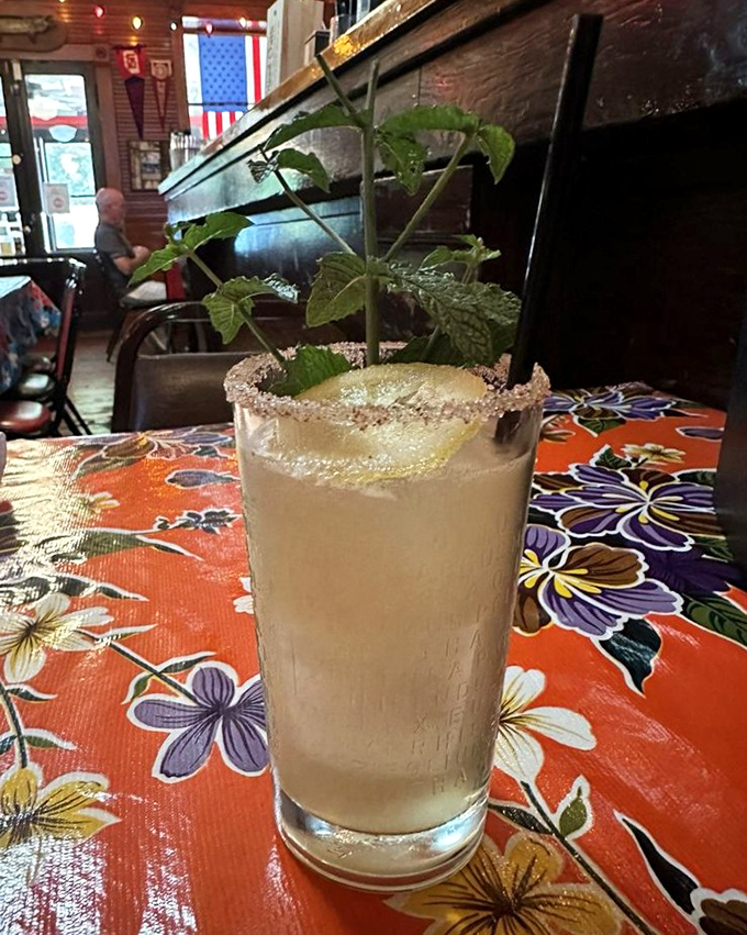 This isn't just a cocktail&mdash;it's a garden in a glass. The sugar rim and mint sprig transform a simple drink into something worth posting about.