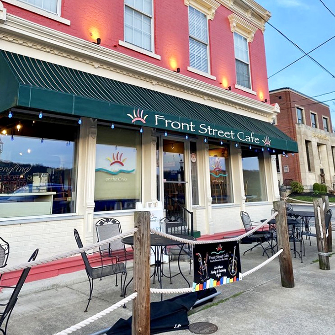 As evening falls, the café's façade glows with invitation. The string lights aren't just decoration—they're a beacon for hungry souls.
