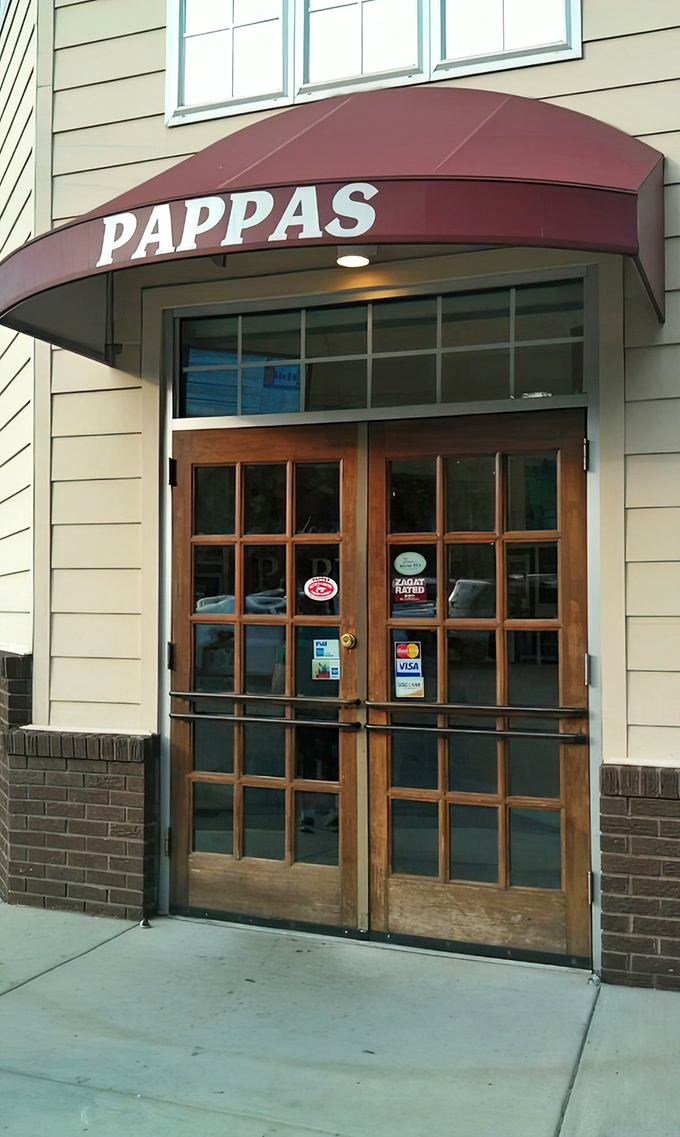 The welcoming entrance to Pappas, where great seafood adventures begin behind these unassuming glass doors.