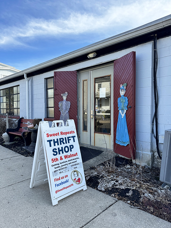 First impressions matter! Sweet Repeats' charming entrance, complete with vintage-inspired signage, promises adventures in bargain hunting beyond those burgundy doors.