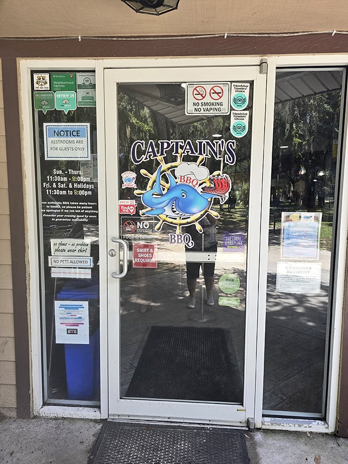 The entrance to Captain's BBQ—like the wardrobe to Narnia, but instead of a magical winter wonderland, you get smoked meat paradise.