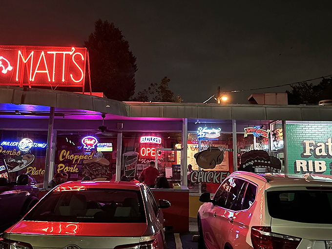 The entrance glows like a portal to pork paradise, welcoming all who seek barbecue enlightenment.