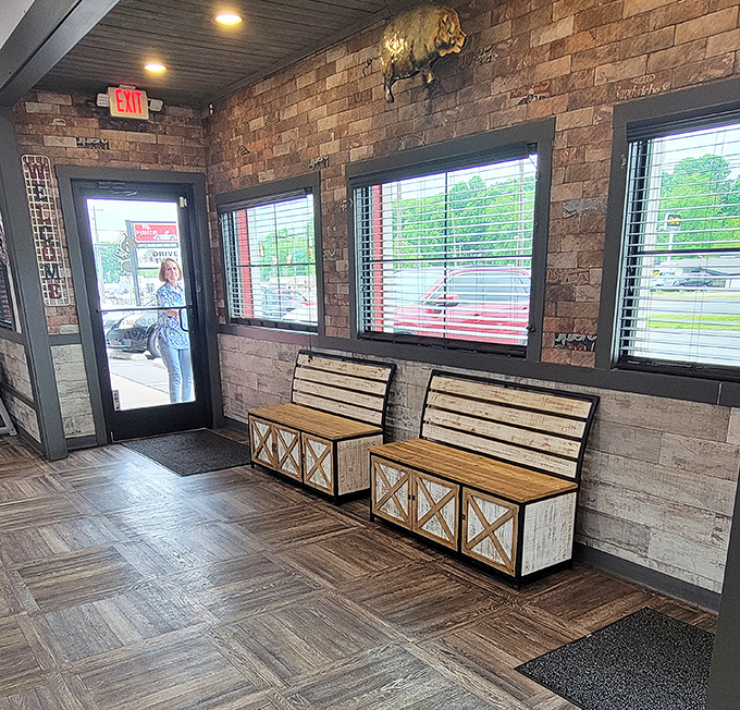 Even on the way out, the warm, rustic charm sticks with you—brick walls, farmhouse benches, and the satisfied feeling only great barbecue can bring.