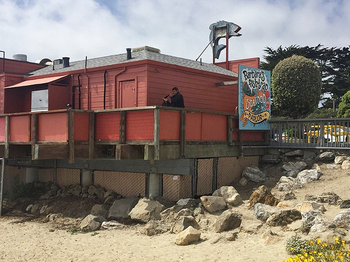 Perched on the edge of the continent, this weathered red building has witnessed countless first bites and satisfied sighs.