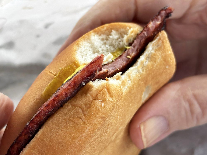 The humble fried bologna sandwich&mdash;childhood nostalgia transformed into grown-up satisfaction on a perfectly soft bun.