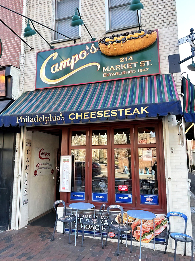 The front entrance to Campo's stands like a portal to sandwich nirvana, with that distinctive awning serving as Philadelphia's tastiest welcome mat.