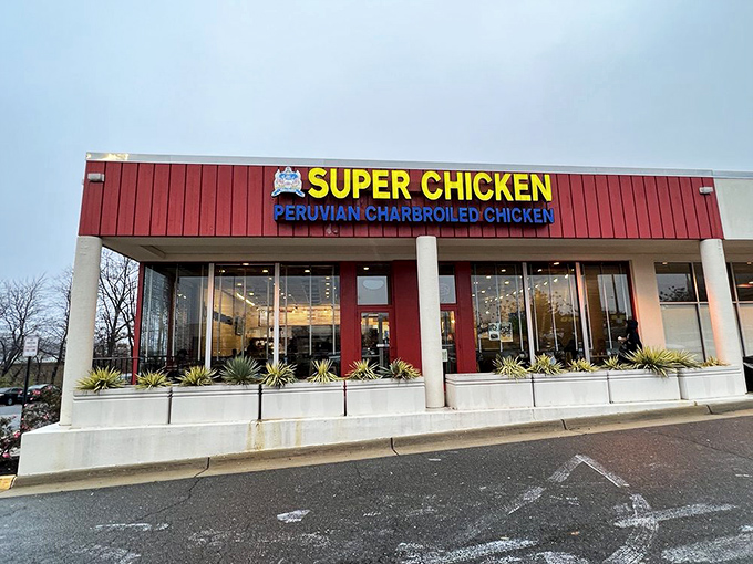 The exterior view that's launched a thousand dinner plans. That sign promises Peruvian charbroiled chicken&mdash;and Super Chicken delivers on that promise.