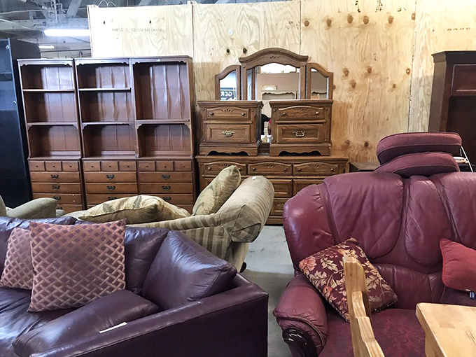 Furniture with history awaits new chapters. These burgundy leather sofas and wooden dressers offer solid craftsmanship at prices that make interior designers weep with joy.