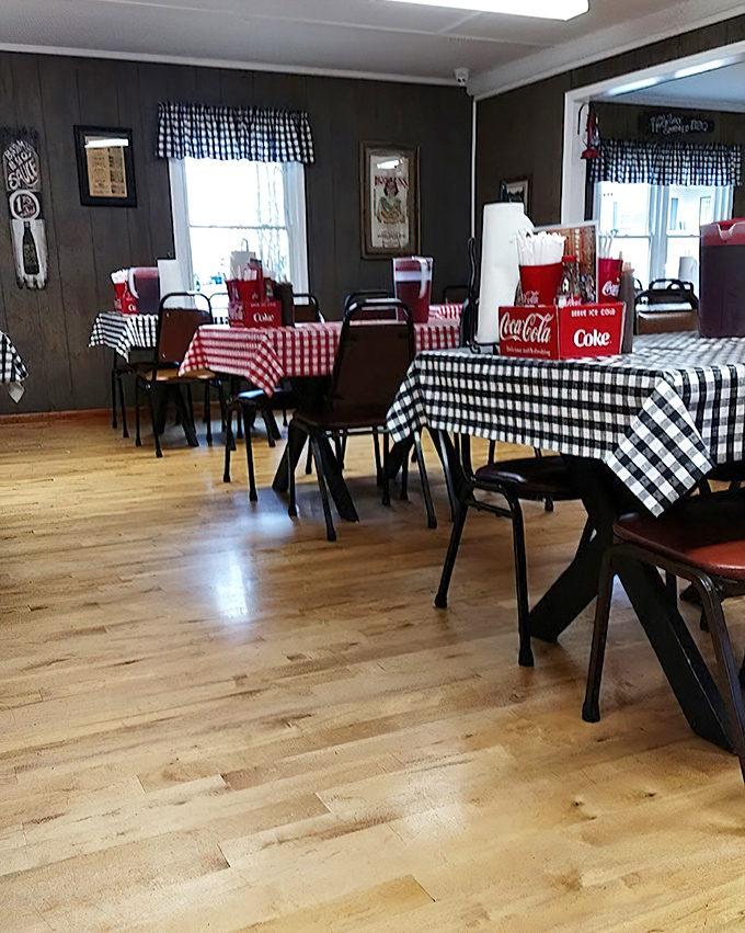 The dining room at Bar-H embodies the barbecue philosophy: no distractions, just checkered tablecloths and the promise of smoky delights to come.