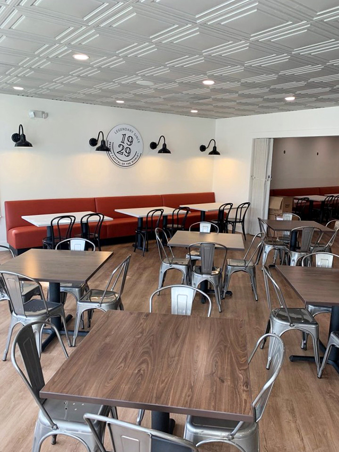 Modern touches meet timeless diner aesthetic. Those red banquettes are practically begging you to slide in and stay awhile.