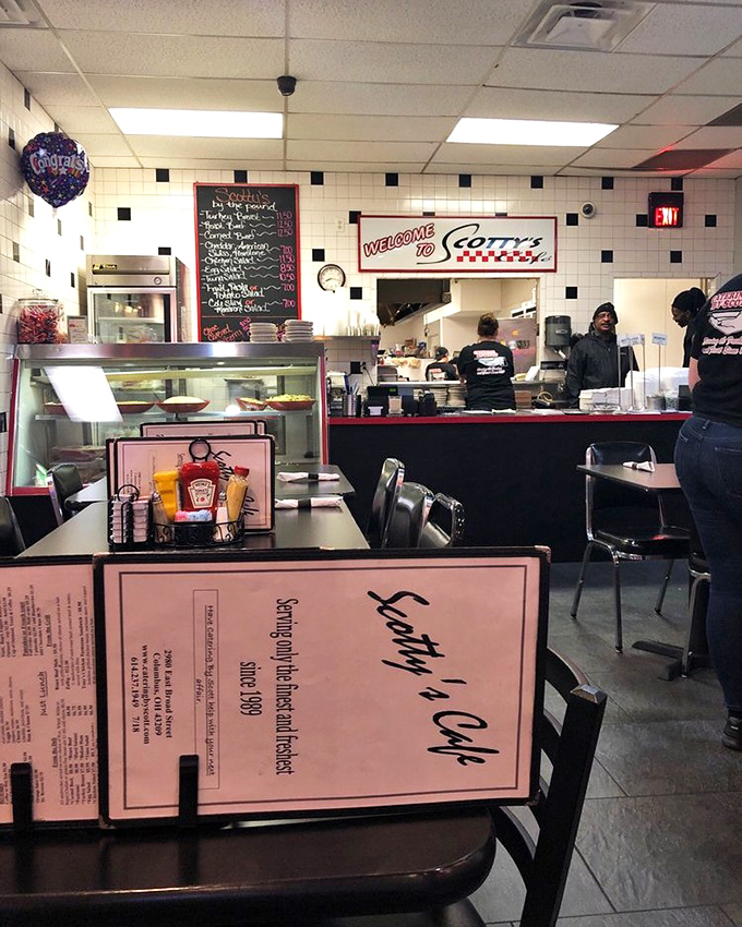 Where the magic happens&mdash;Scotty's kitchen and counter. The welcome sign says it all: this is a place that wants you to feel at home.