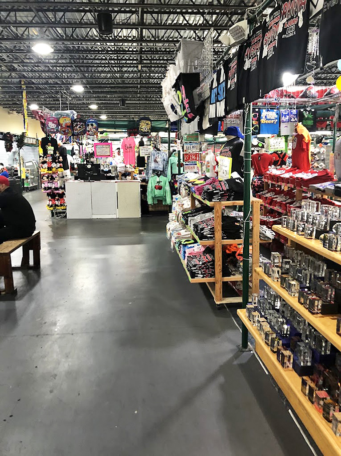 The endless aisles of possibility. Visitors Flea Market's interior stretches as far as the eye can see, promising treasures for those willing to explore.