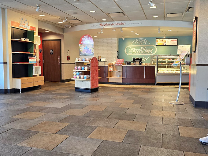 The "Smiles" bakery counter promises sweet endings to every meal, standing ready to send you home with treats that continue the comfort food experience.
