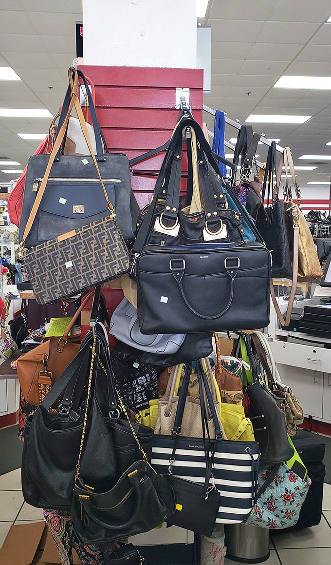 The handbag tree bears designer fruit at fraction-of-retail prices. That Fendi pattern peeking out might be your luckiest find of the day.