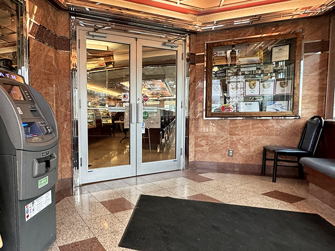 The lobby's marble-tiled welcome area&mdash;your first hint that this isn't just any diner, but a temple to timeless American comfort food.