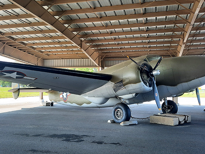 Under the shelter of a simple hangar rests an extraordinary machine that changed the course of history one flight at a time.