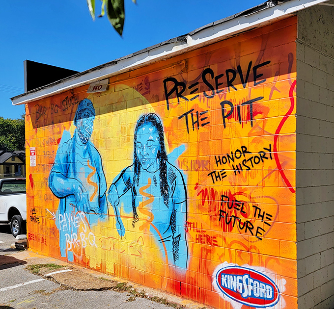 Street art that tells the story&mdash;"Preserve the Pits, Honor the History"&mdash;a colorful reminder of barbecue's deep cultural roots.