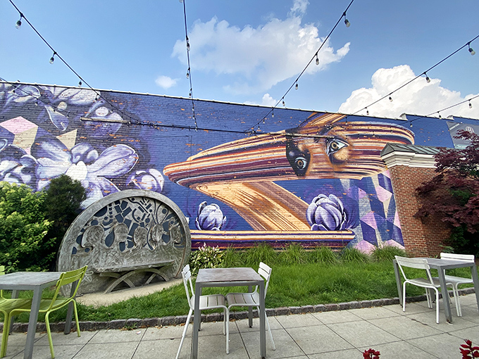 Dining alongside this vibrant mural feels like you've scored a table at the intersection of street art and culinary excellence.