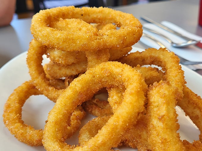 Onion rings with the structural integrity of Olympic gold&mdash;crispy armor protecting sweet, tender onion that surrenders at first bite.