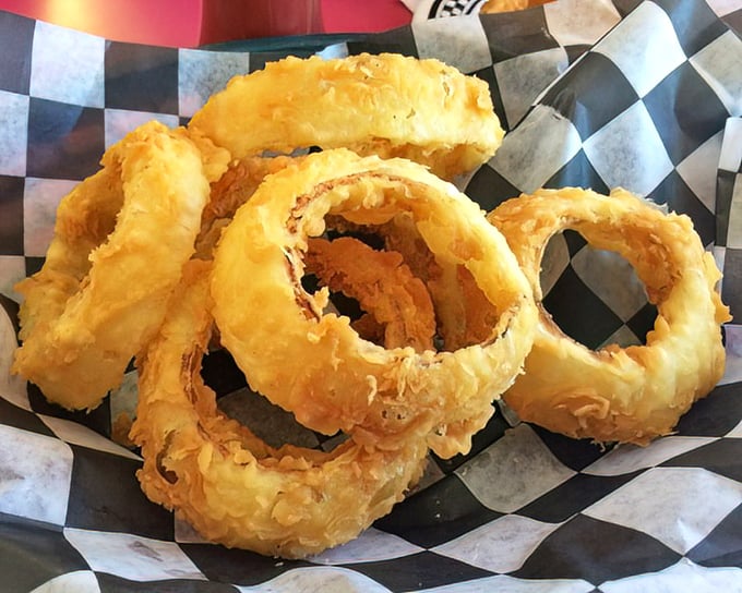 Onion rings that could double as golden halos for saints who appreciate properly fried food—crispy, never greasy, always perfect.