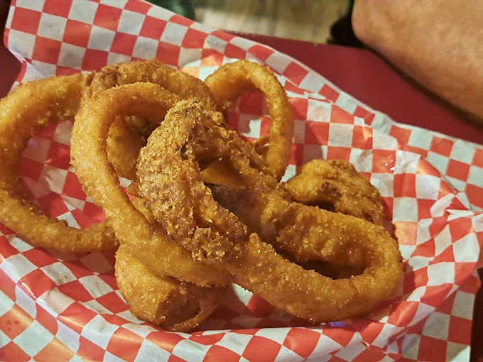 Golden onion rings that crunch louder than your dad's favorite vinyl records—perfectly fried circles of joy that deserve their own fan club.