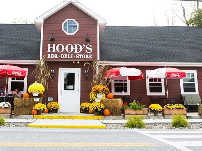 Fall decorations frame the entrance like nature's way of saying, "Get in here before hibernation season &ndash; you'll need these calories."