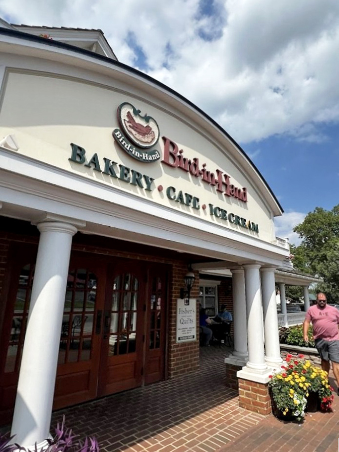 The grand entrance with its stately columns suggests you're not just buying baked goods &ndash; you're entering a temple dedicated to the religion of butter and sugar.