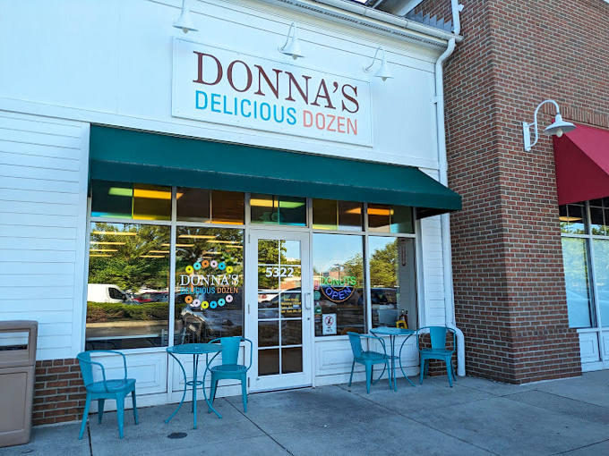 Cheerful teal chairs outside Donna's create the perfect perch for donut enjoyment &ndash; because some pleasures are too good to wait until home.