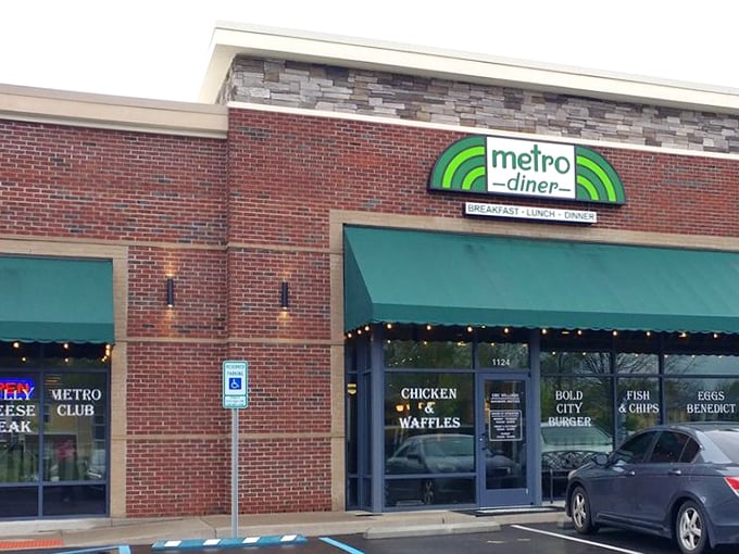 The storefront proudly advertises its specialty in glowing letters. When a place puts "CHICKEN & WAFFLES" on the window, they're making a delicious promise.