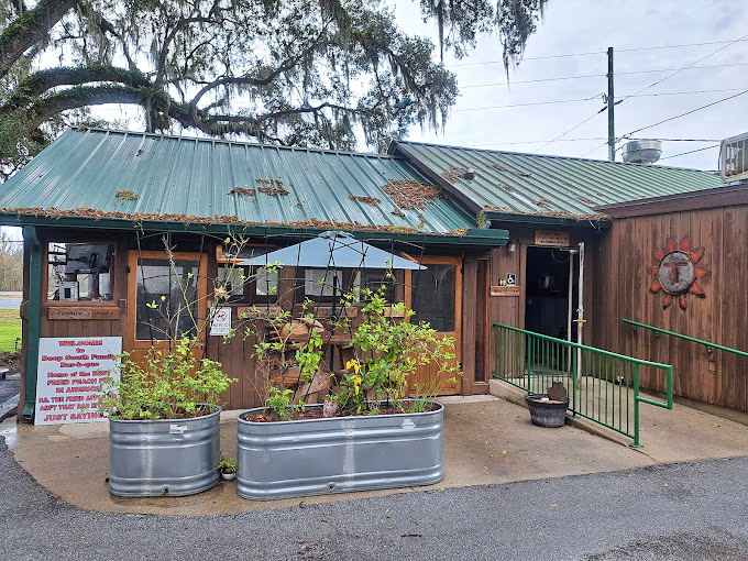 Rustic charm meets serious barbecue business in this weathered temple of smoke and flavor.