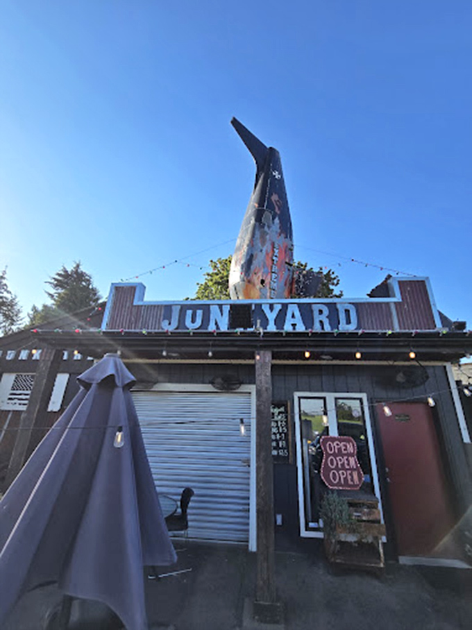 The iconic entrance, where that shark fin silhouette against blue Oregon skies promises unforgettable meals and zero regrets.