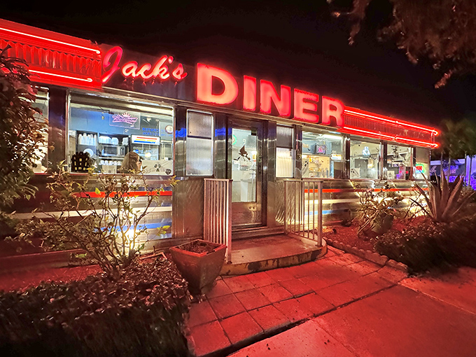 At night, Jack's neon glow transforms into a beacon for hungry souls seeking refuge from fancy food and complicated menus.