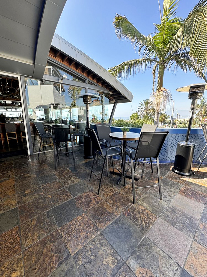 The outdoor patio – where ocean breezes enhance every bite and the boundary between restaurant and paradise becomes deliciously blurred.