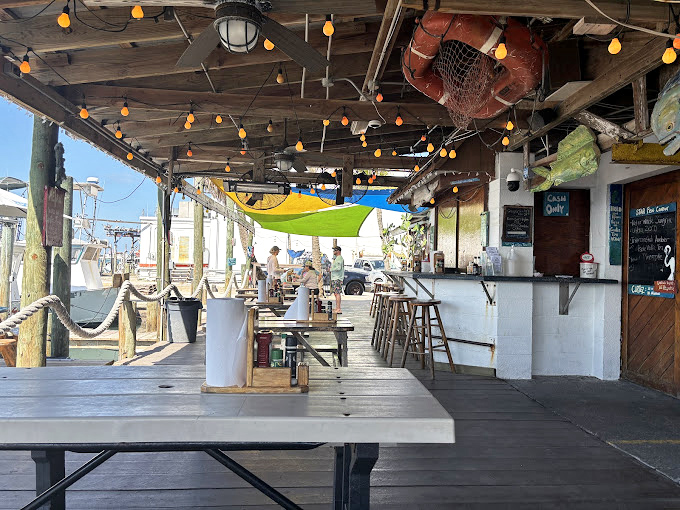 Open-air seating with million-dollar water views that remind you why Florida's fishing villages remain magical places.