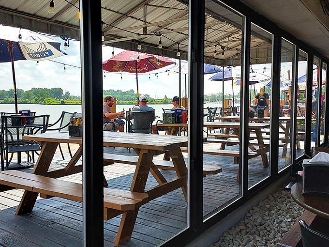 Outdoor dining here feels like discovering your own private resort, complete with umbrella shade and endless water views.