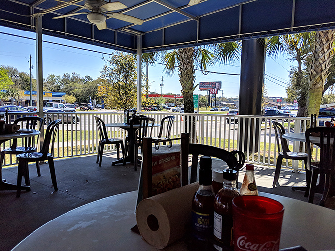 Florida sunshine and gentle breezes complement every bite on this covered patio. The perfect spot for a lazy afternoon seafood session.