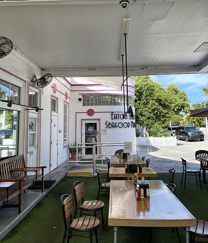 The outdoor patio—where Key West's perfect weather meets perfect seafood in a marriage that would make meteorologists weep with joy.