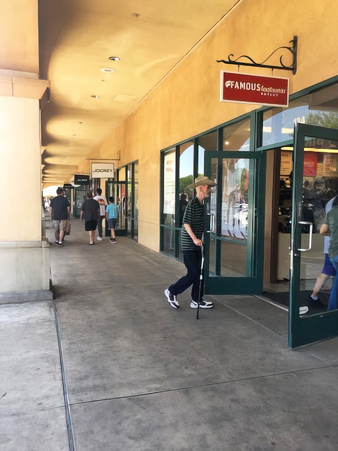 The outdoor walkways connect fashion universes like a shopping solar system. Famous Footwear today, Jockey tomorrow, bankruptcy next month.