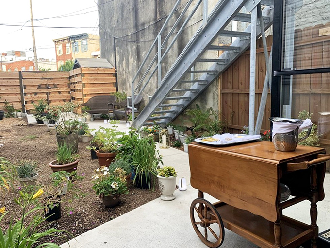 The secret garden patio where summer meals unfold &ndash; an urban oasis complete with herbs that might just end up on your plate.
