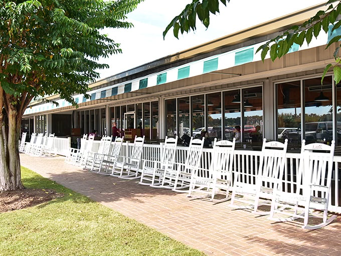 A row of rocking chairs that whisper, "Sit a spell." The front porch philosophy department of Lane Southern Orchards is always in session.