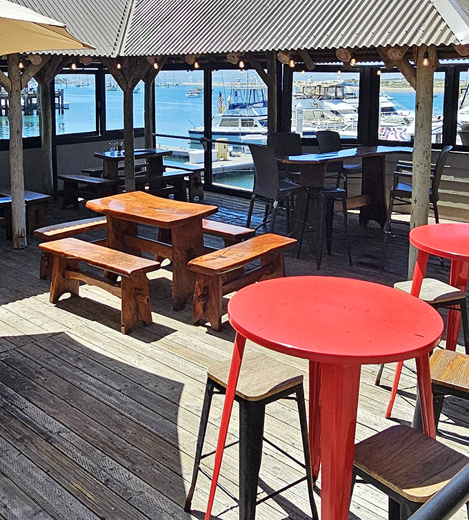 The outdoor deck offers harbor breezes with your meal&mdash;picnic tables and bright red accents creating a casual vibe for serious eating.