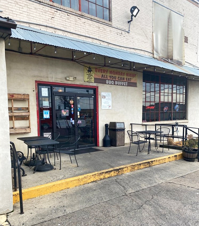 The modest patio entrance announces an "All You Can Eat BBQ Buffet"&mdash;six words that could make a grown person weep with joy.