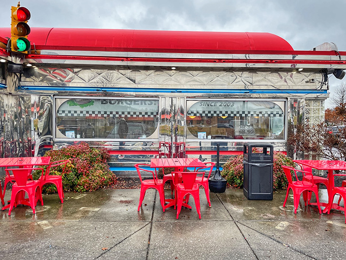Even the outdoor seating area screams "classic Americana." Those red chairs aren't just furniture&mdash;they're front-row seats to the theater of diner life.