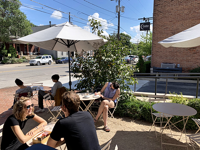Outdoor seating where German Village charm meets French caf&eacute; culture &ndash; people-watching paradise with a pastry in hand.