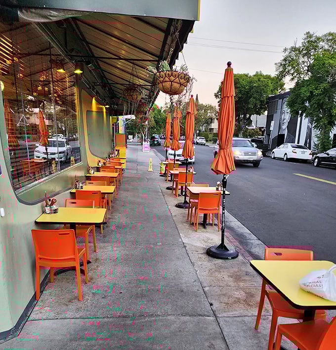 Sidewalk seating that captures the essence of Los Feliz living &ndash; casual, colorful, and perfectly positioned for people-watching between bites.