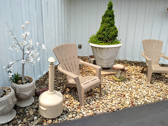 A peaceful outdoor seating area where you can digest both your meal and your thoughts. The perfect spot for a post-BBQ moment of zen.