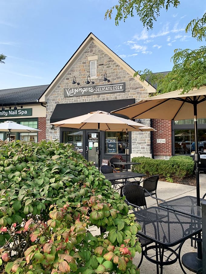 When Ohio weather cooperates, these outdoor tables become prime real estate. Fresh air somehow makes those towering sandwiches taste even better.