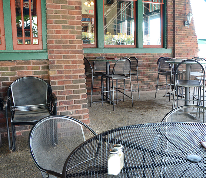 Outdoor seating where summer breezes complement your meal. The perfect spot to contemplate life's big questions, like "Should I order dessert?" (The answer is always yes.)