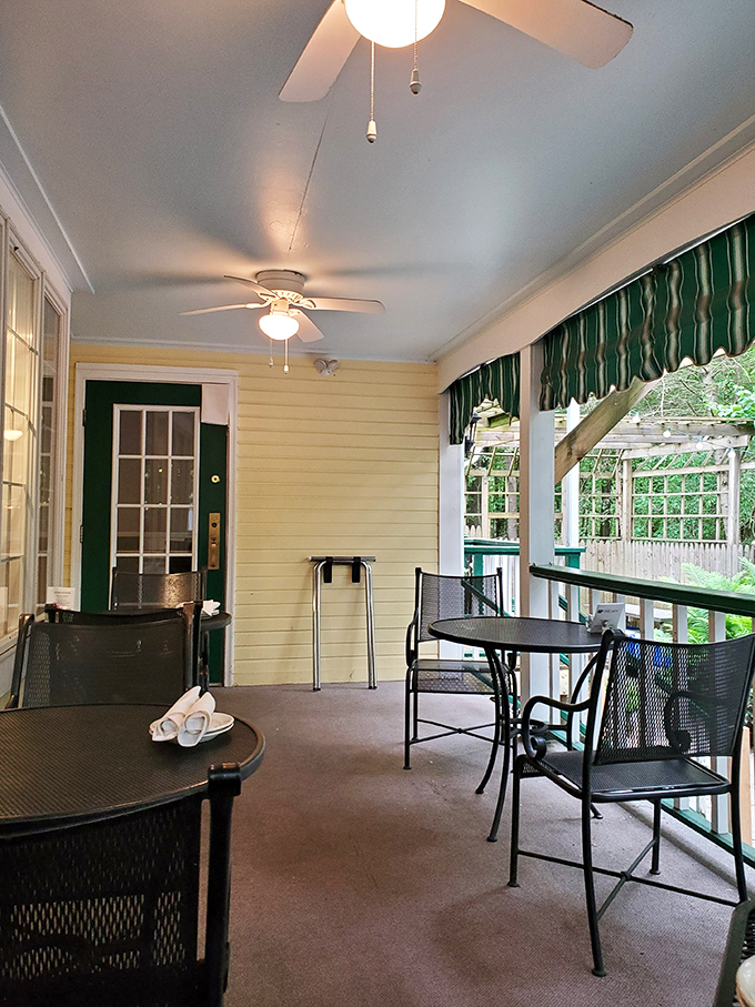 The outdoor seating area whispers promises of summer evenings with good food, better company, and conversations that stretch into twilight.