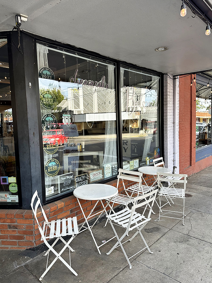 Sidewalk seating offers a front-row view of downtown Albany, perfect for people-watching while contemplating the meaning of cheesecake in your life.